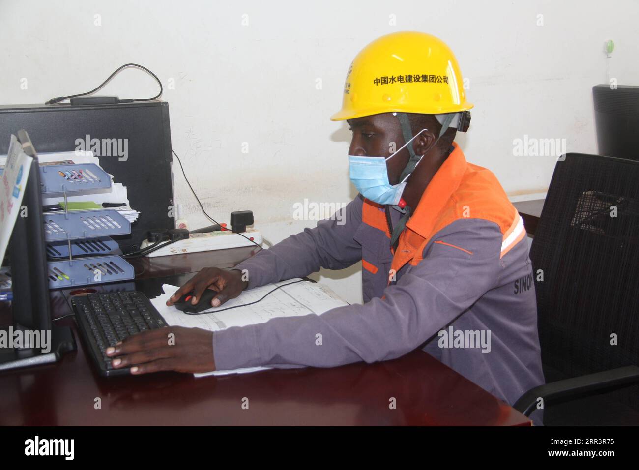 201109 -- KIRYANDONGO UGANDA, Nov. 9, 2020 -- Civil engineer Andrew ...