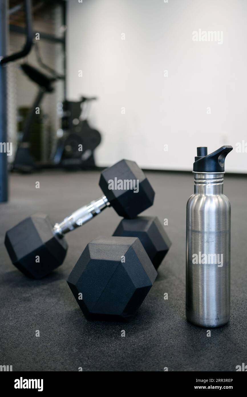 Concept: return to routine. Training equipment and steel water bottle ...