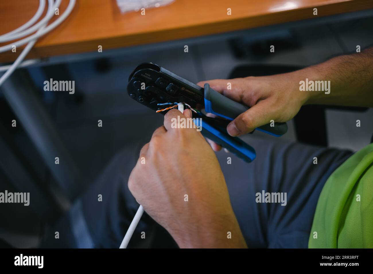 Close up hands cutting ethernet hi-res stock photography and images - Alamy