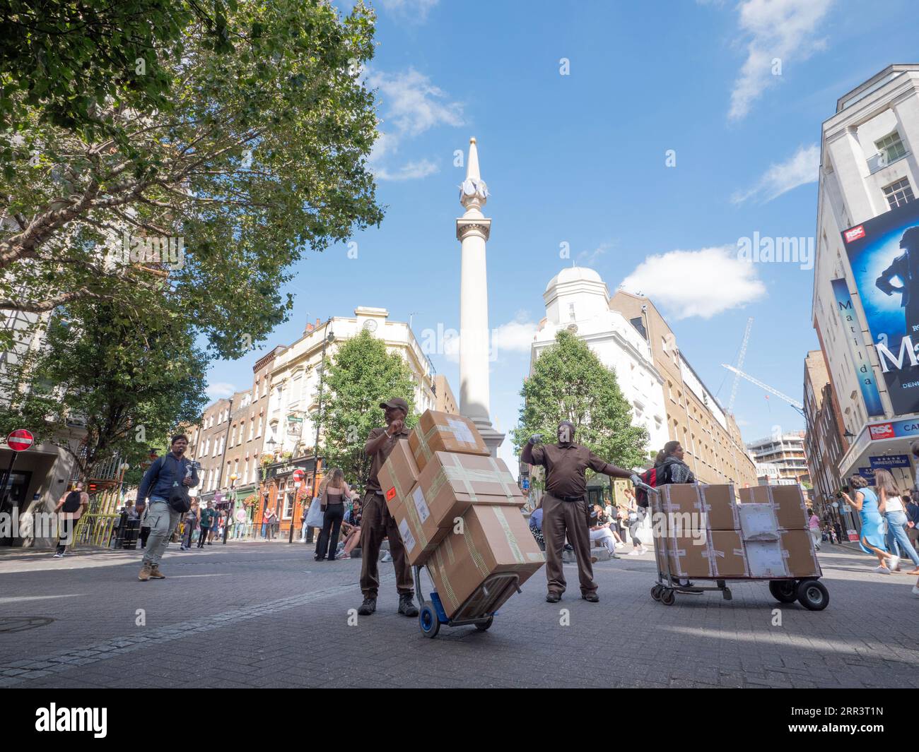 UPS parcel workers Seven Dials London Stock Photo - Alamy