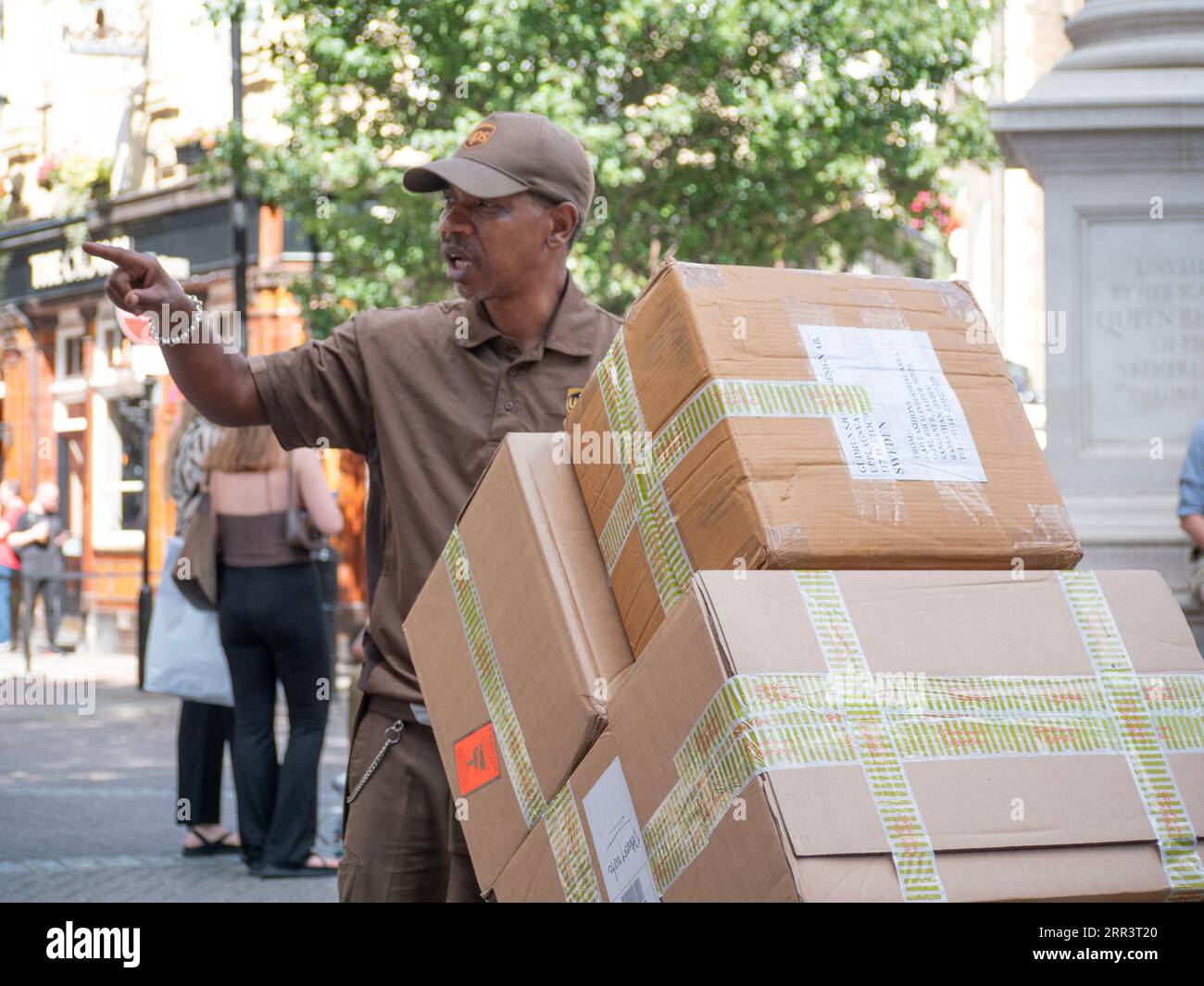 UPS parcel workers Seven Dials London Stock Photo - Alamy