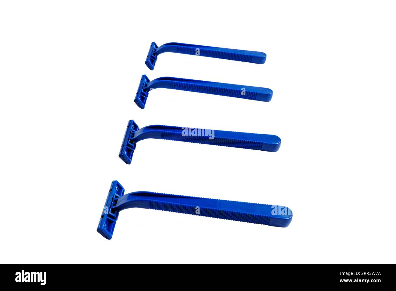 Non-permanent blue plastic shaving machine isolated on white background ...