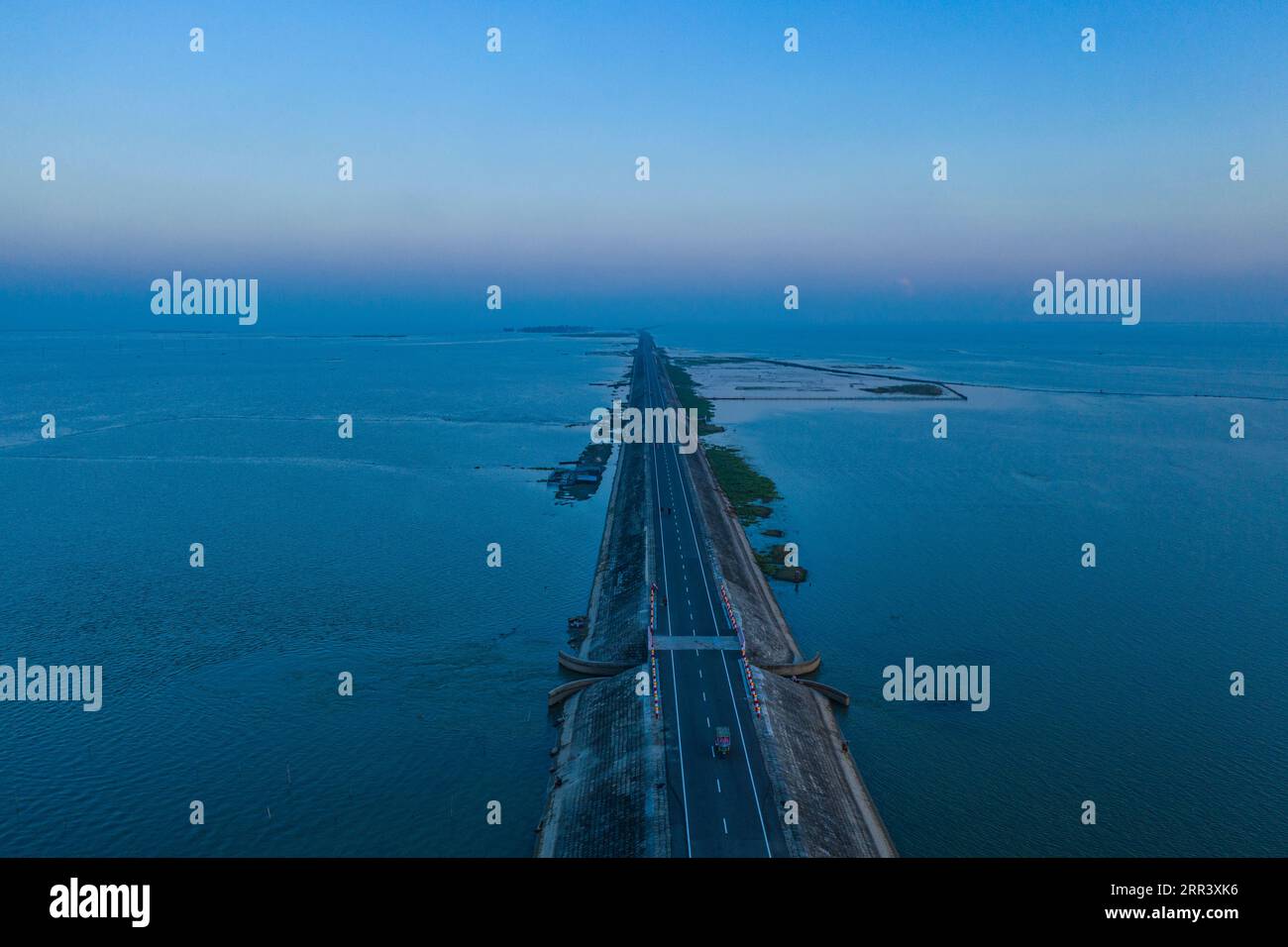 Itna-Mithamoin-Austagram all-weather road goes straight through a vast ...