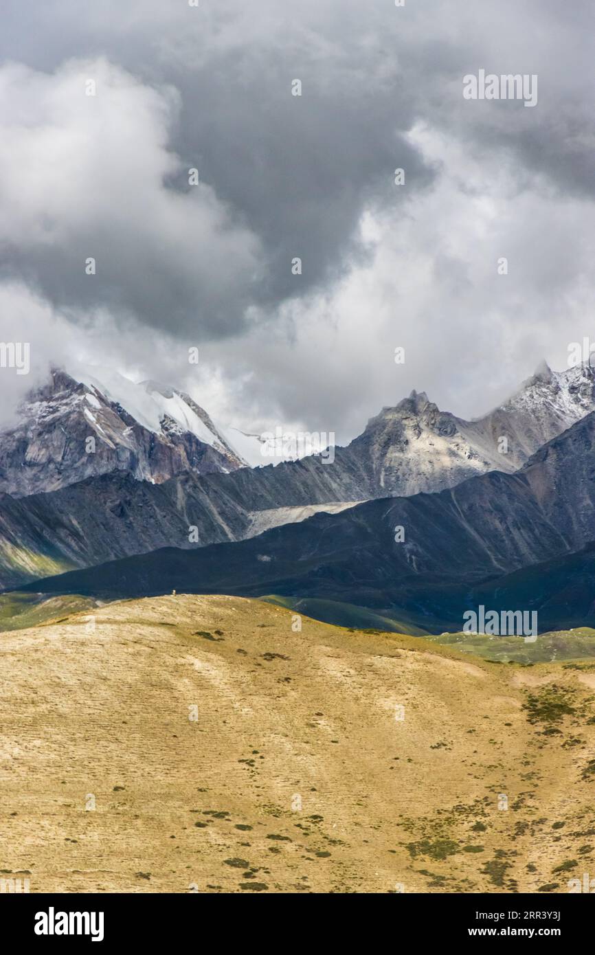 Dark Clouds HImalayan Mountains and Road to Korala Border between Tibet ...