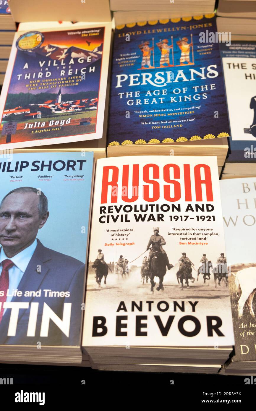 Vertical view of Russian books about Russia for sale on table inside ...