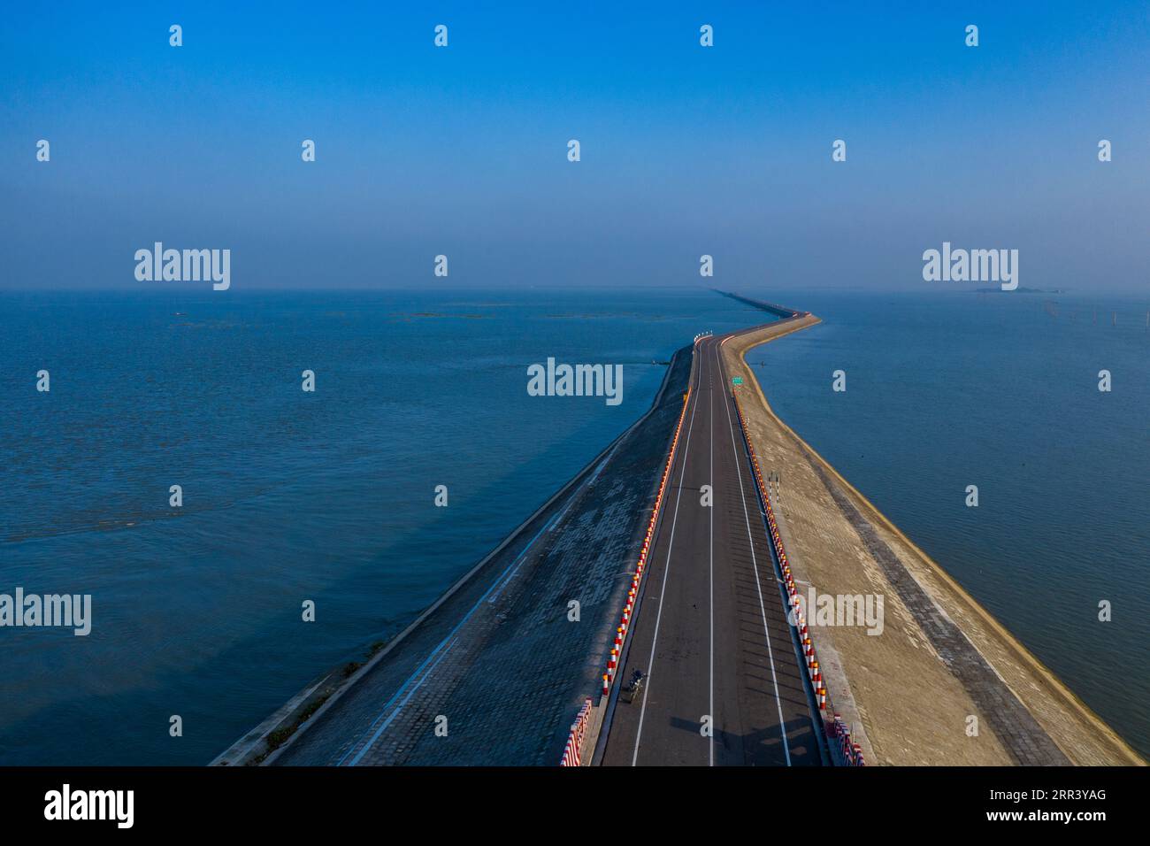 Itna-Mithamoin-Austagram all-weather road goes straight through a vast ...