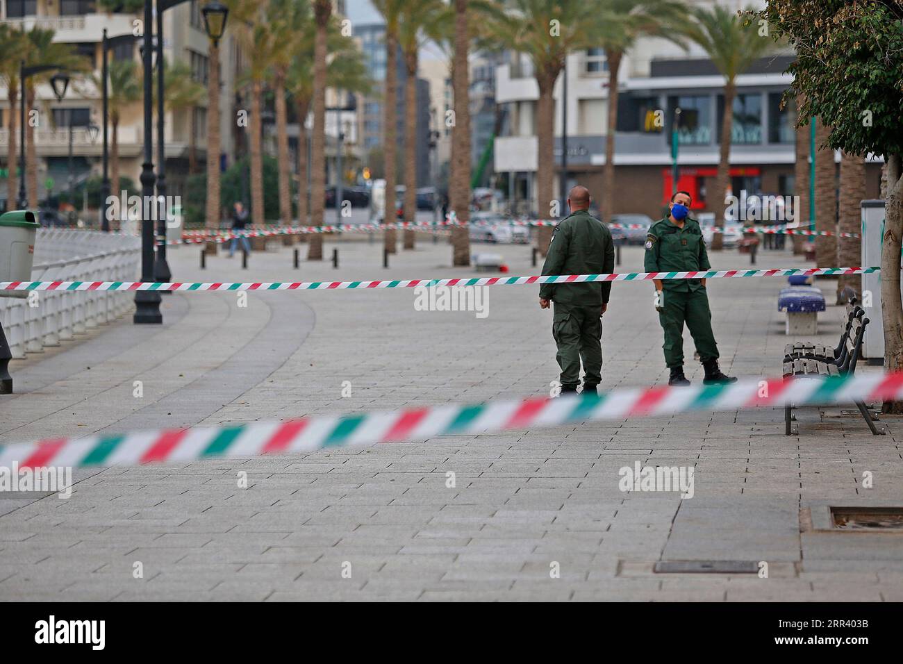 201115 -- BEIRUT, Nov. 15, 2020 -- Police stand guard at a cordoned off ...