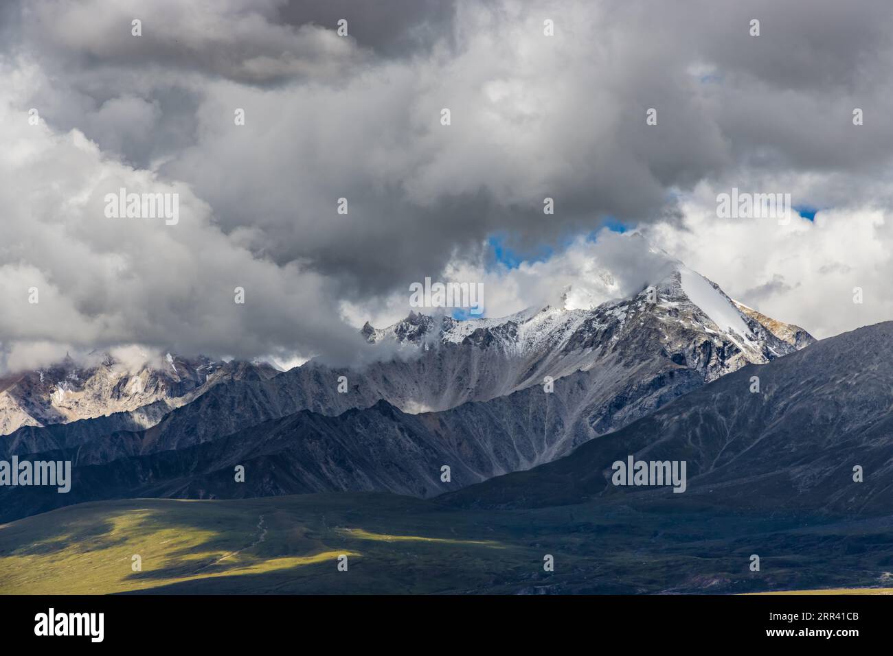 Dark Clouds HImalayan Mountains and Road to Korala Border between Tibet ...