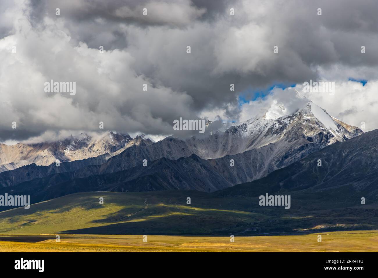 Dark Clouds HImalayan Mountains and Road to Korala Border between Tibet ...