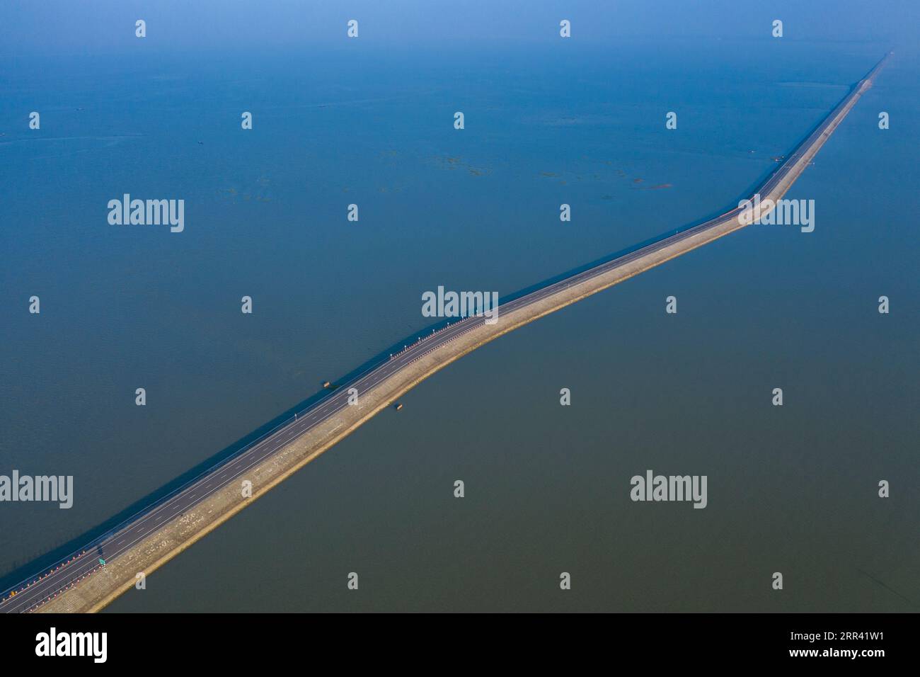 Itna-Mithamoin-Austagram all-weather road goes straight through a vast ...