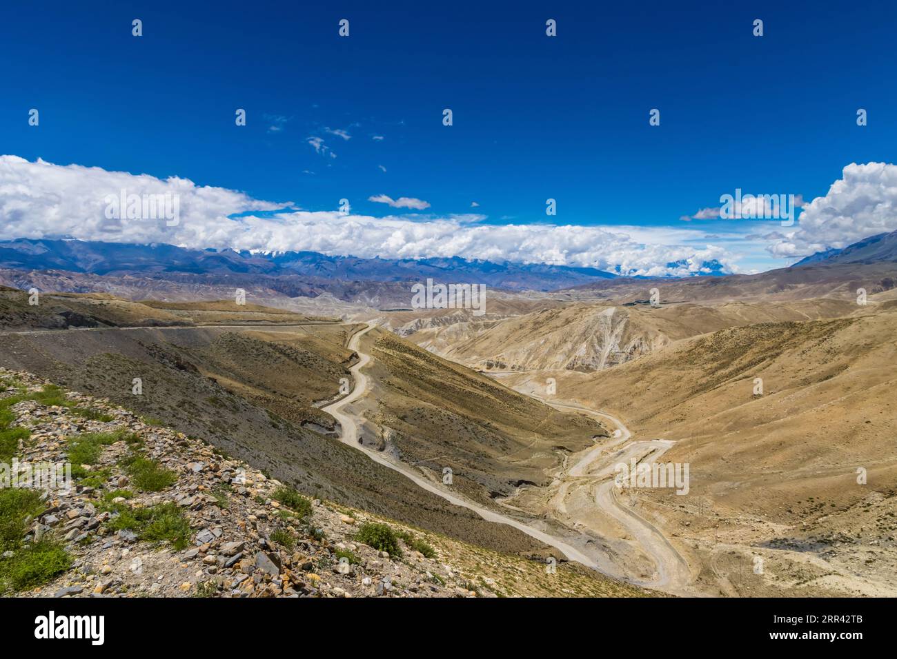 Dark Clouds HImalayan Mountains and Road to Korala Border between Tibet ...