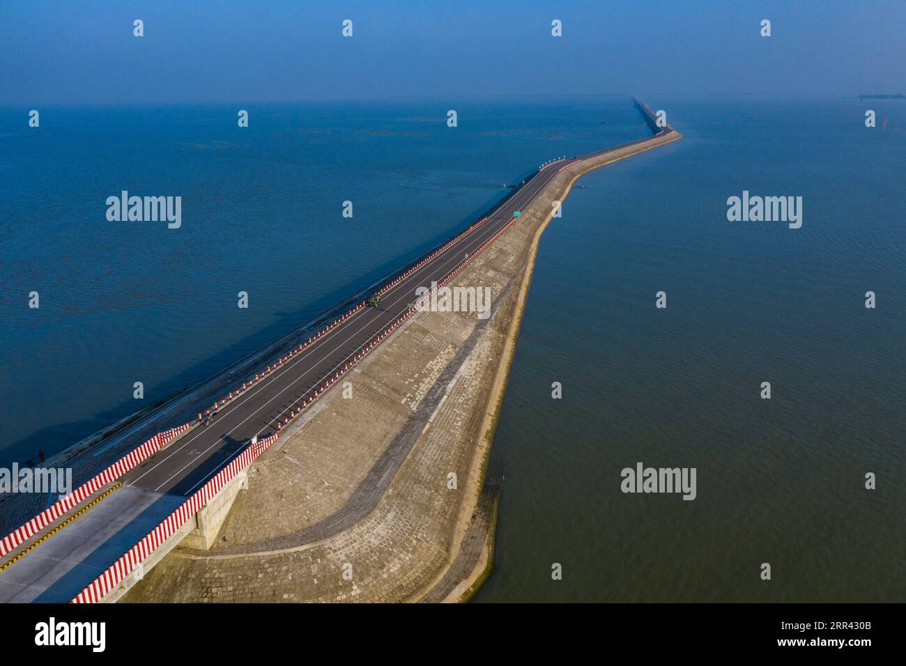 Itna-Mithamoin-Austagram all-weather road goes straight through a vast ...