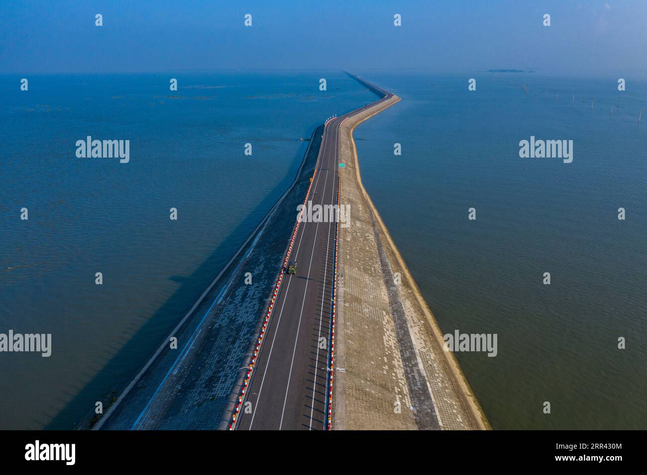 Itna-Mithamoin-Austagram all-weather road goes straight through a vast ...