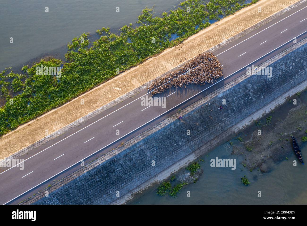 Itna-Mithamoin-Austagram all-weather road goes straight through a vast ...