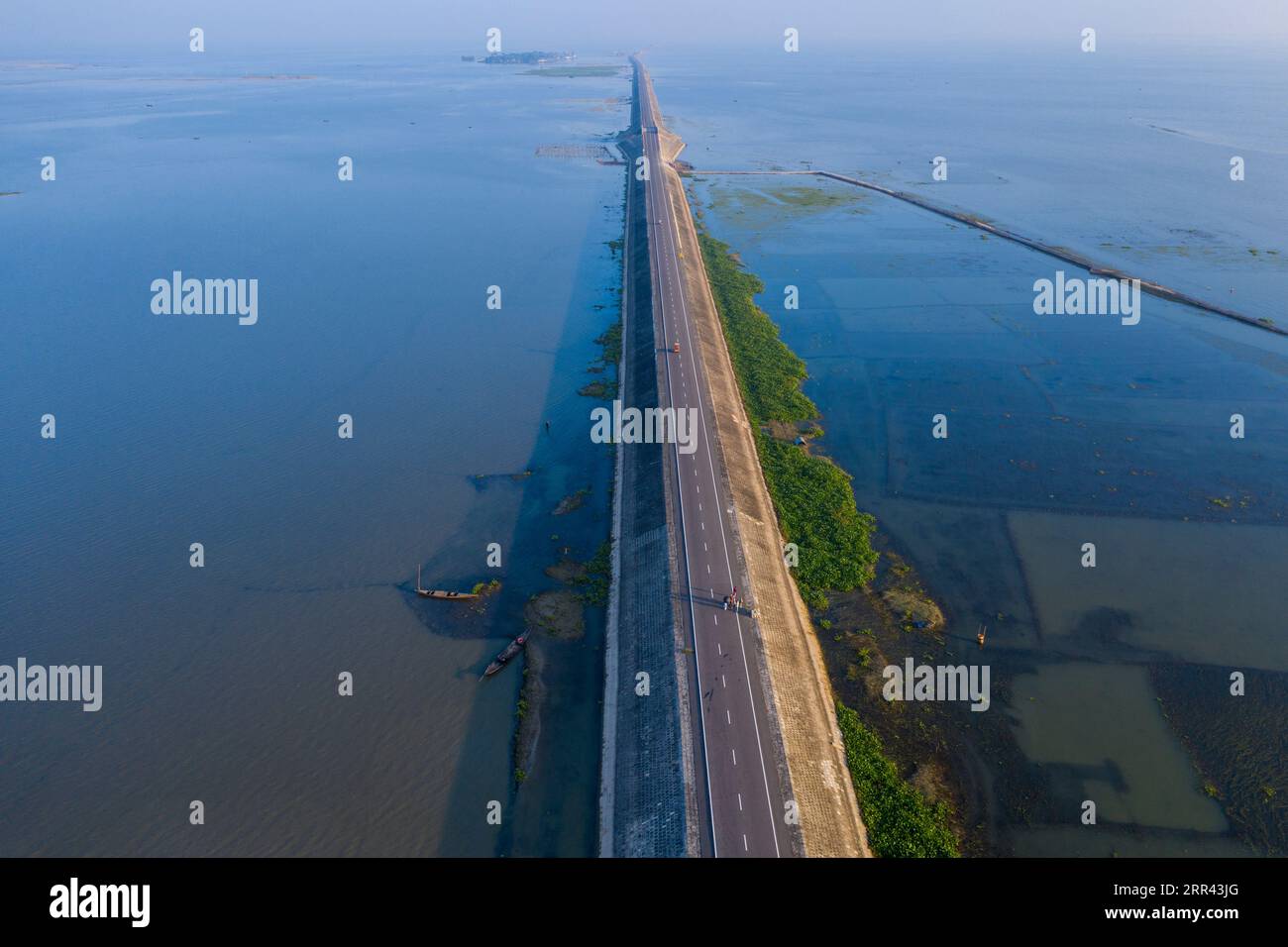 Itna-Mithamoin-Austagram all-weather road goes straight through a vast ...