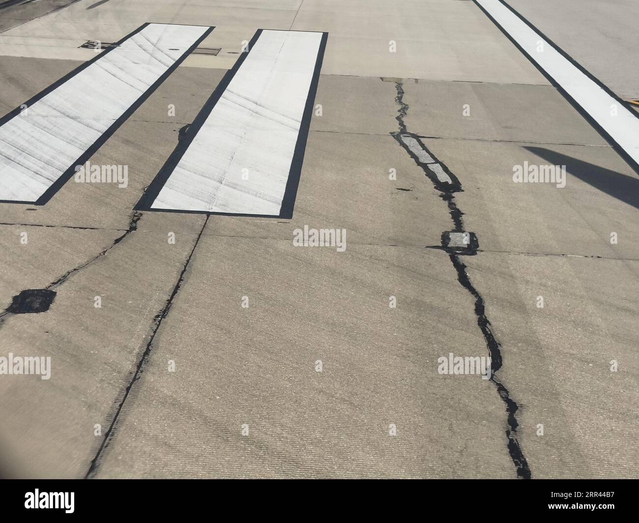 Details of a airport’s runway Stock Photo - Alamy