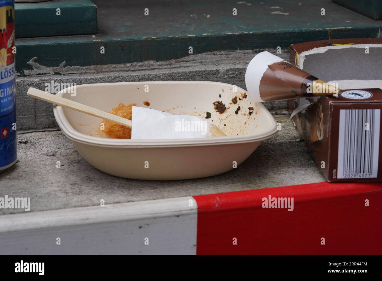 Single use fork in a Styrofoam container for street food with used ...