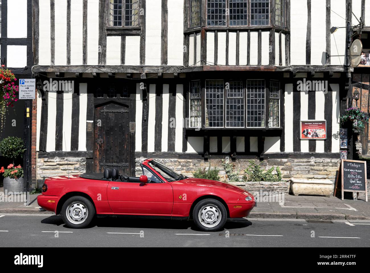 Mazda MX-5 NA in red. Japanese convertible roadster classic sports car ...