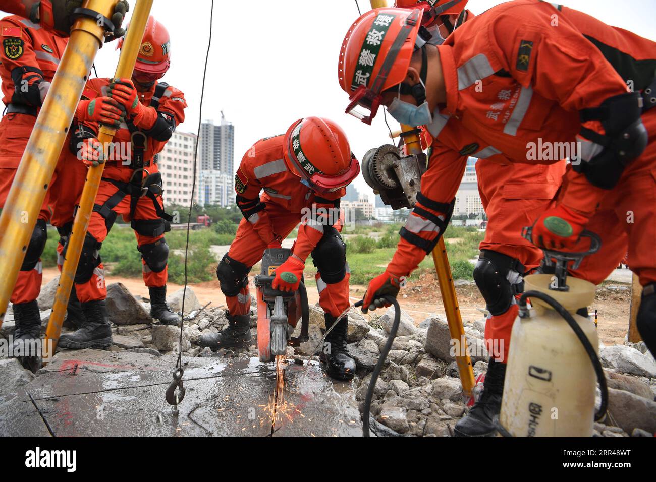 201125 -- HAIKOU, Nov. 25, 2020 -- Rescuers work during an earthquake ...