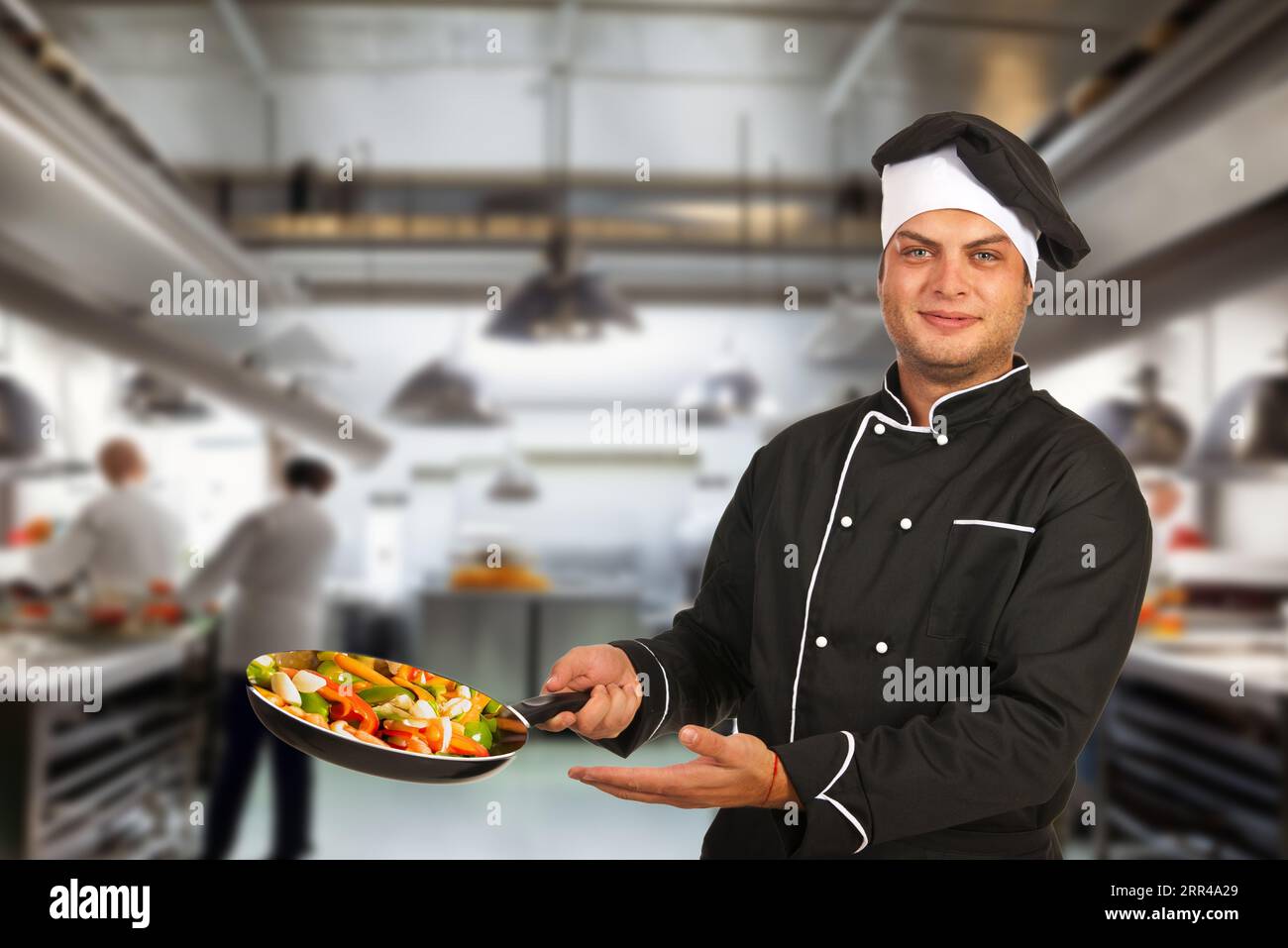 Professional cook dressed in hi-res stock photography and images - Alamy