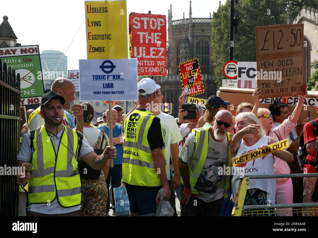 London, UK. 06th Sep, 2023. Anti-ULEZ protesters hold placards ...