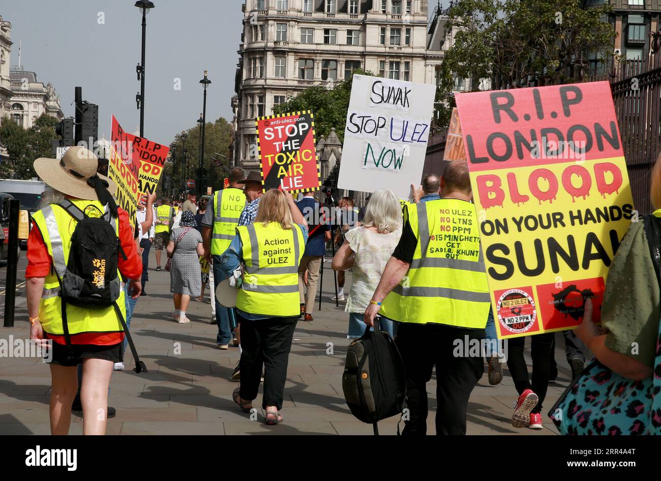 London, UK. 06th Sep, 2023. Anti-ULEZ protesters hold placards ...