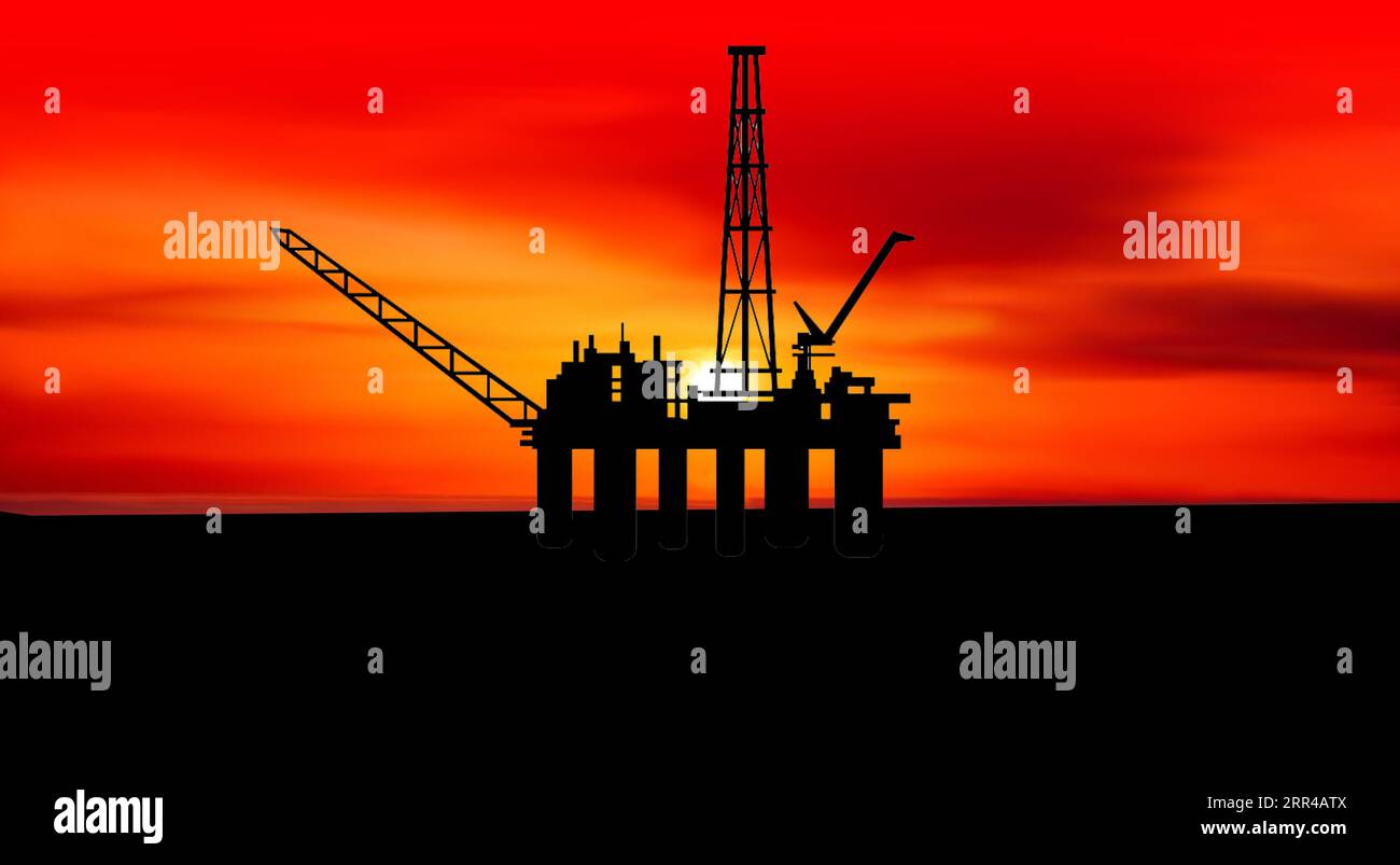 Silhouette of a floating production platform in Sea region, with sunset ...