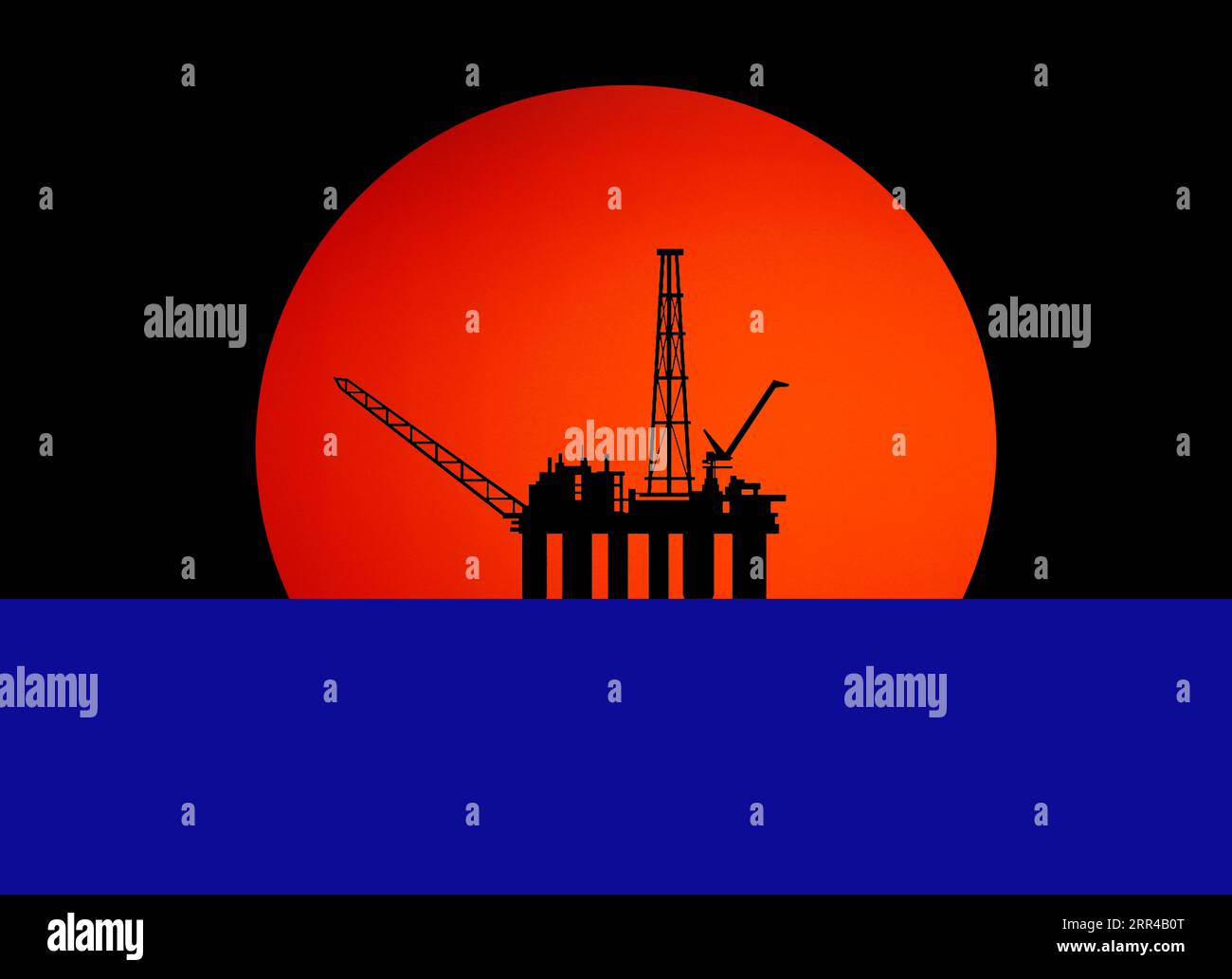 Silhouette of a floating production platform in Sea region, with sunset ...