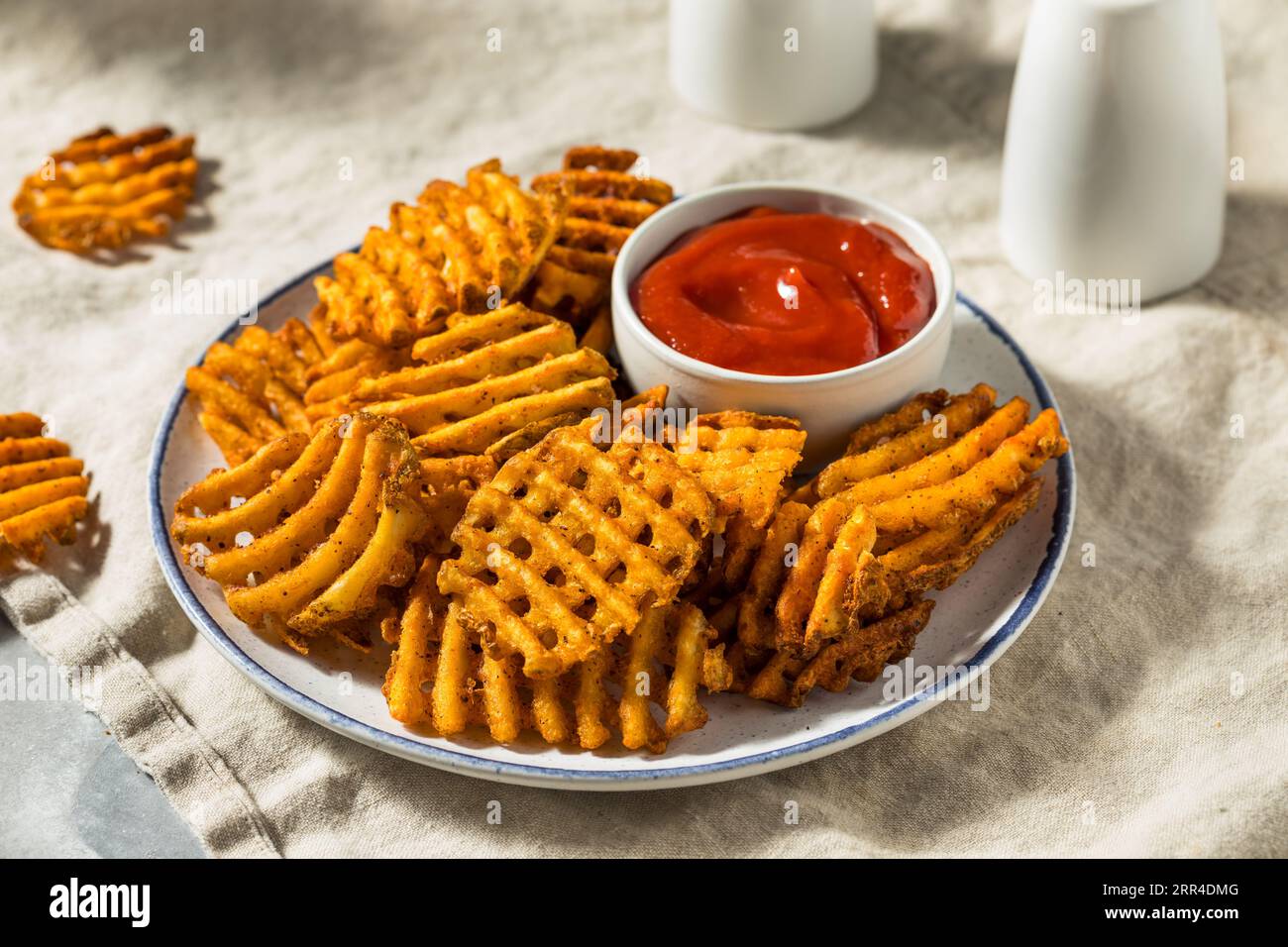 Salty Organic Waffle French Fries with Seasoning and Ketchup Stock ...