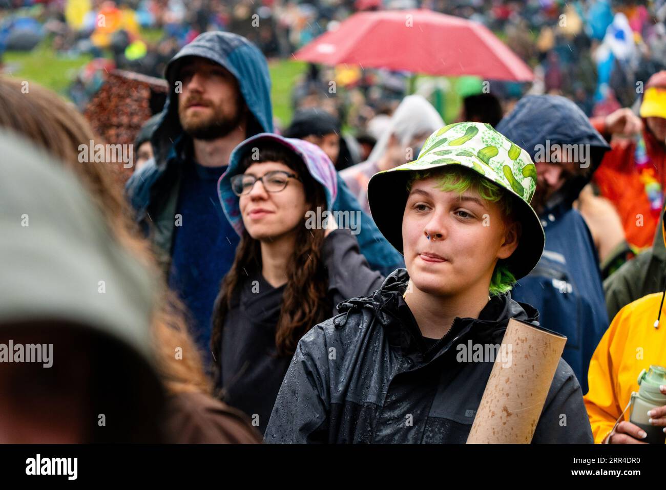 Smiles at the main Mountain Stage despite the rainstorm rain and mud ...