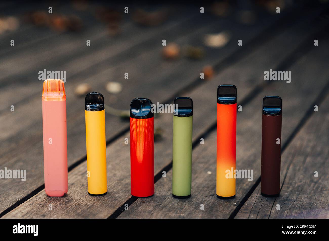 Vaping devices. Set of colorful electronic cigarettes. Electronic ...