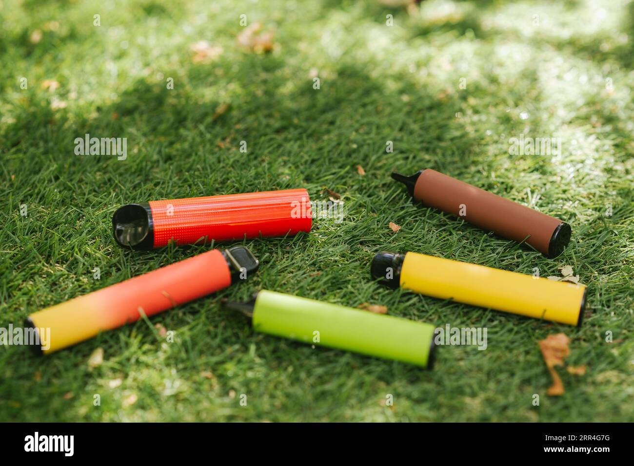 Vaping devices. Set of colorful electronic cigarettes. Electronic ...