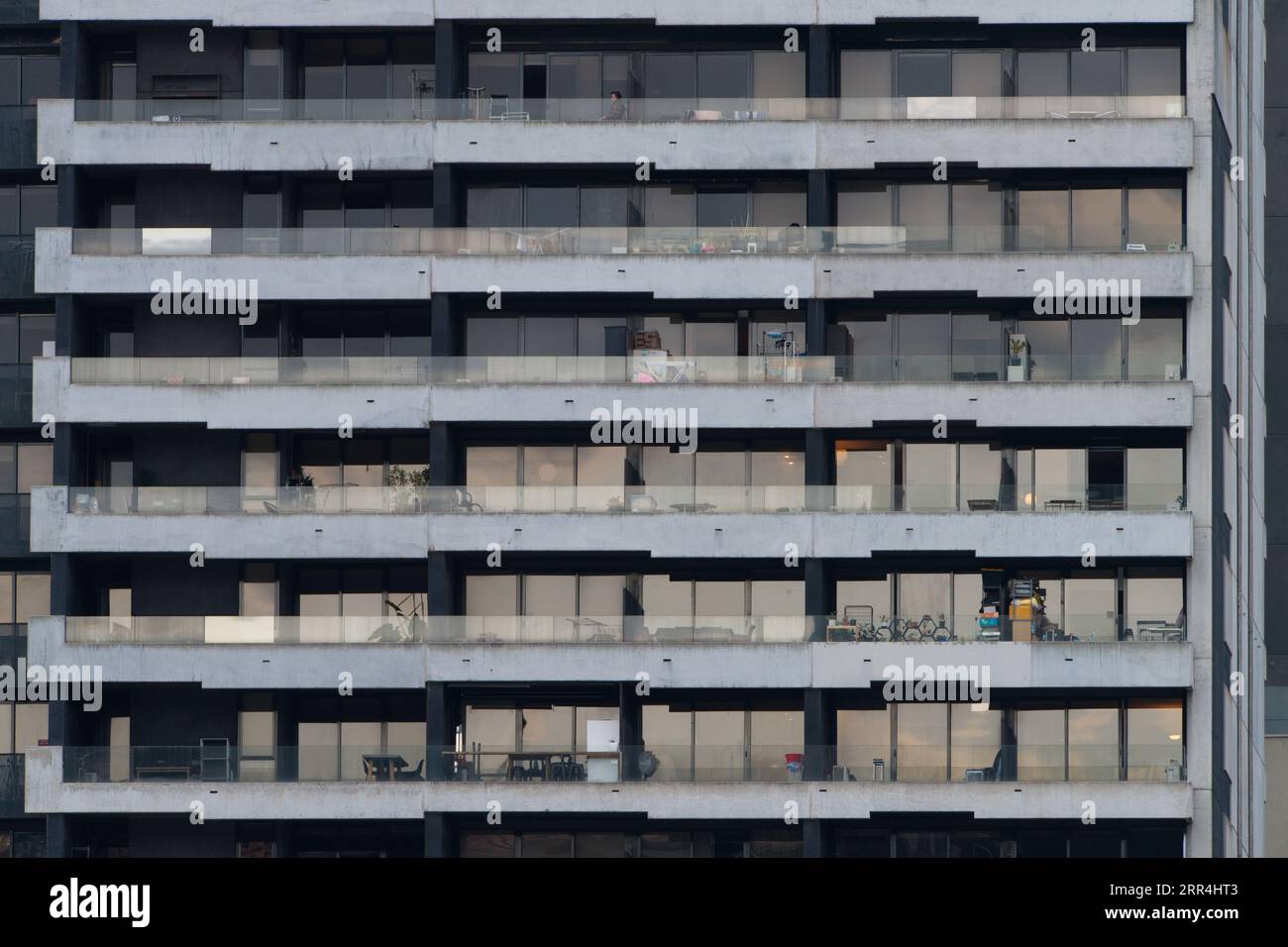 Office building day time view showing glass window patterns and ...