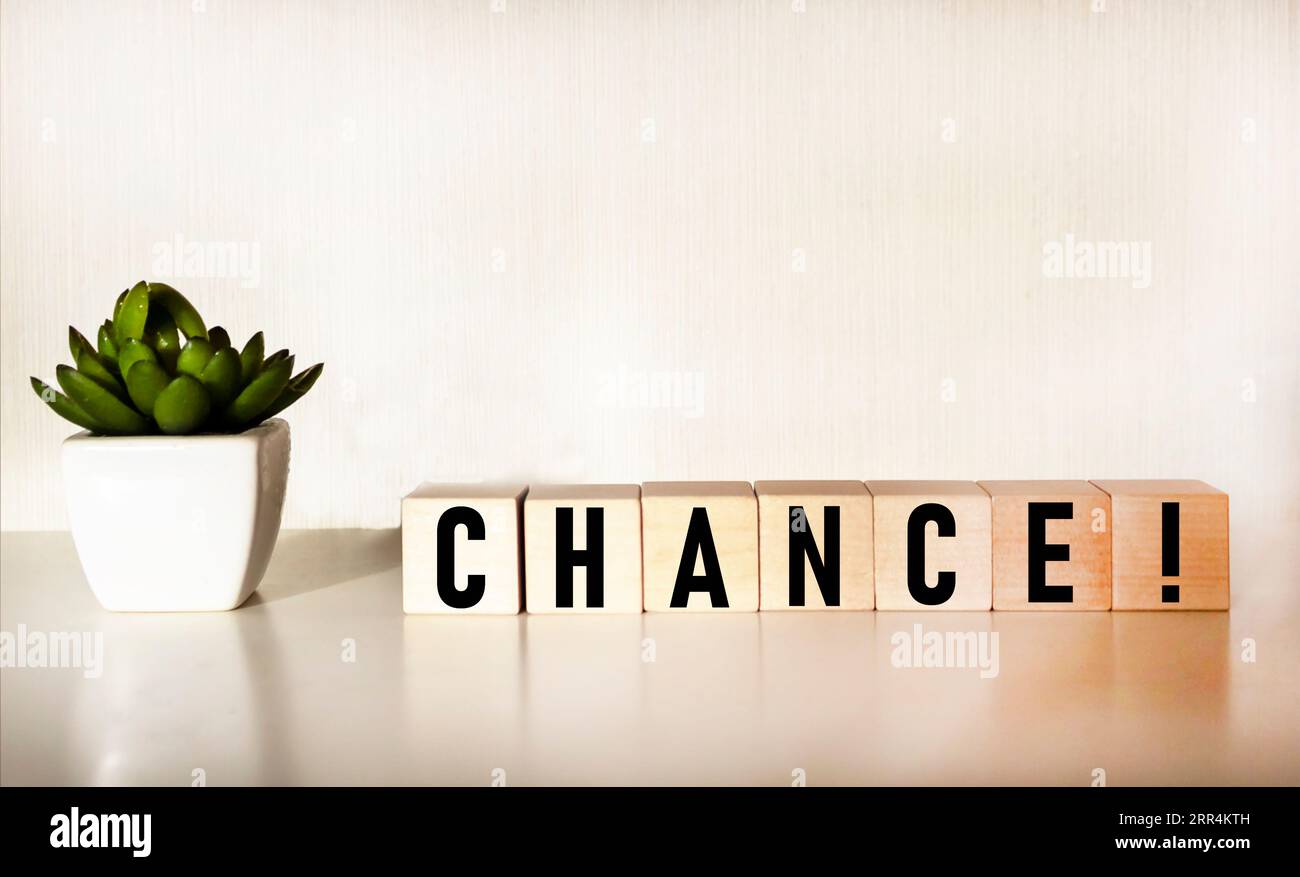 Wooden cubes with inscriptions Chance. Changes and new chances in a ...