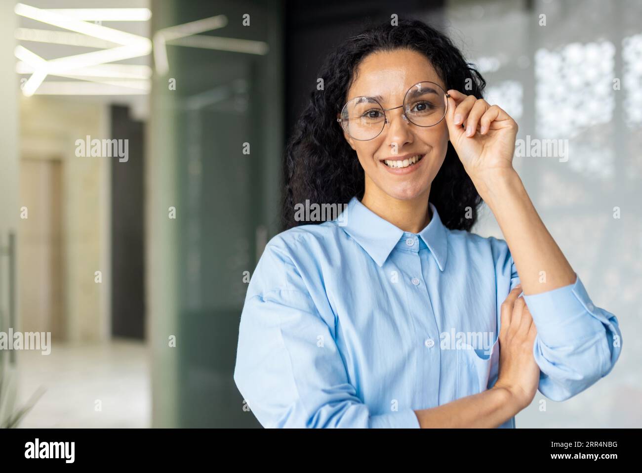 Portrait of happy and successful business woman, boss in shirt smiling ...