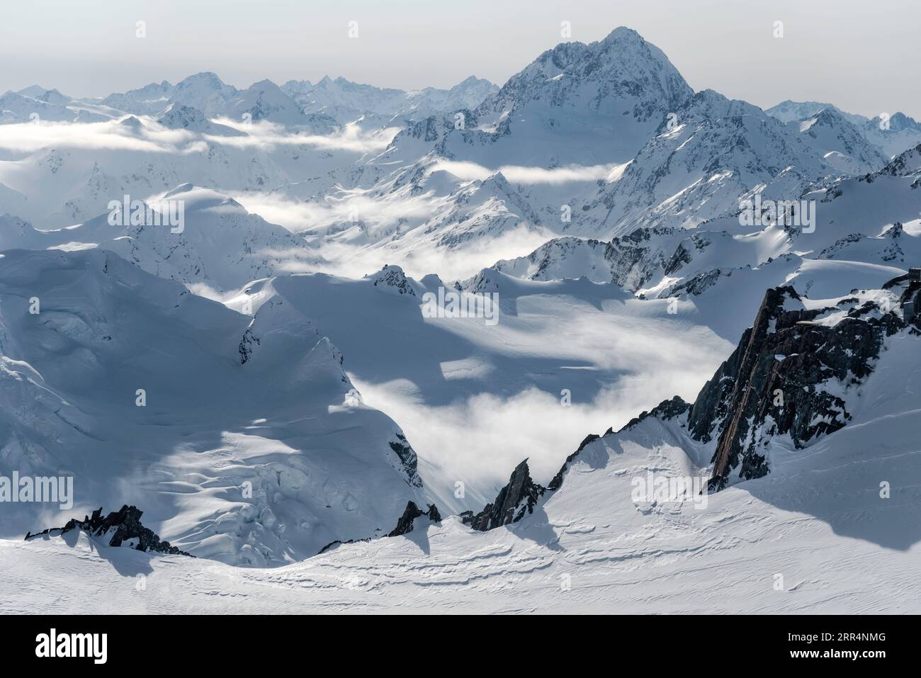 Many frozen layers of the Southern Alps viewed from a helicopter over ...