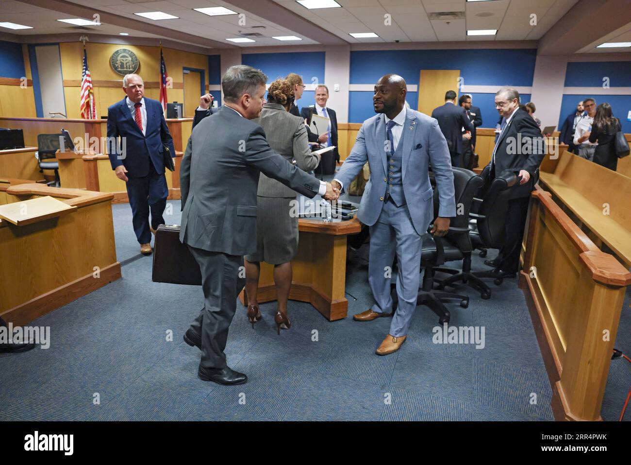 Attorney Brian Rafferty (left), who is defending Sidney Powell, and ...