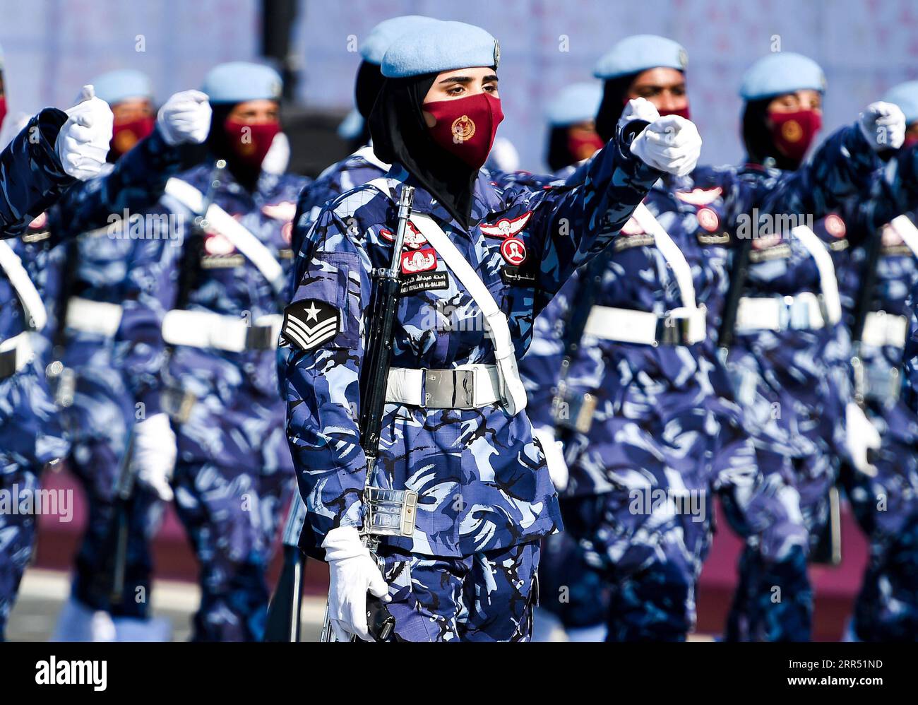201219 -- DOHA, Dec. 19, 2020 -- Members of the Qatari women armed ...