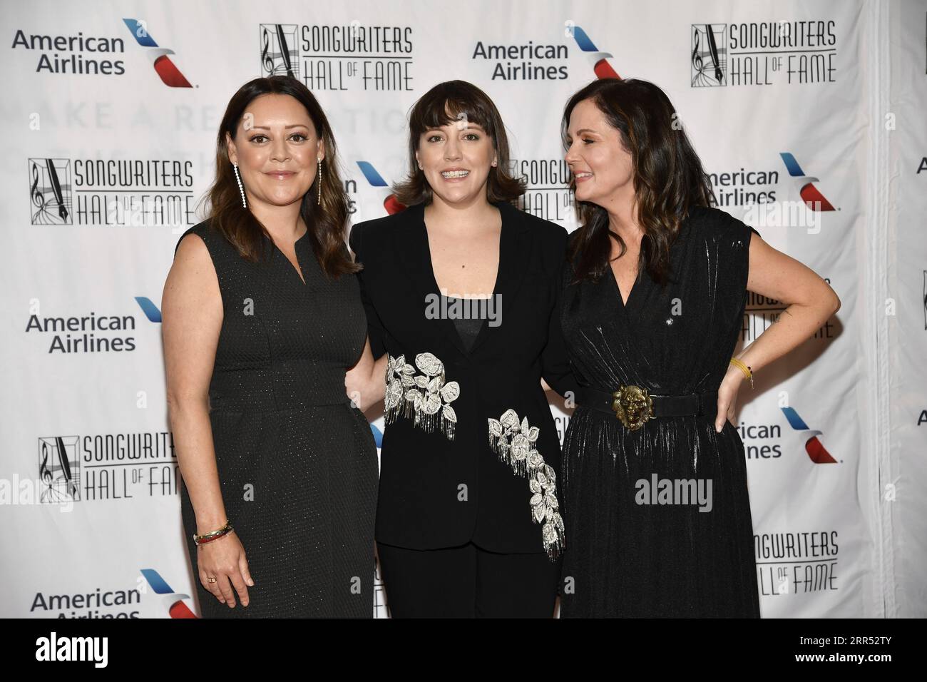 Hillary Lindsey, left, Caitlin Rose and Lori McKenna attend the 52nd ...
