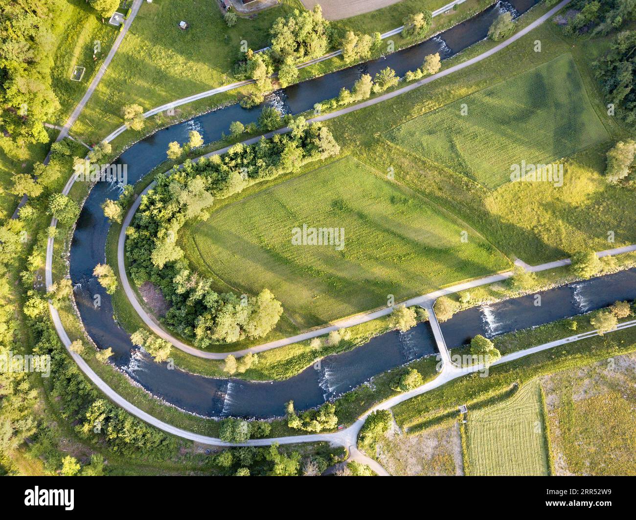 Aerial image of the winding river Glatt through fields and forest in ...