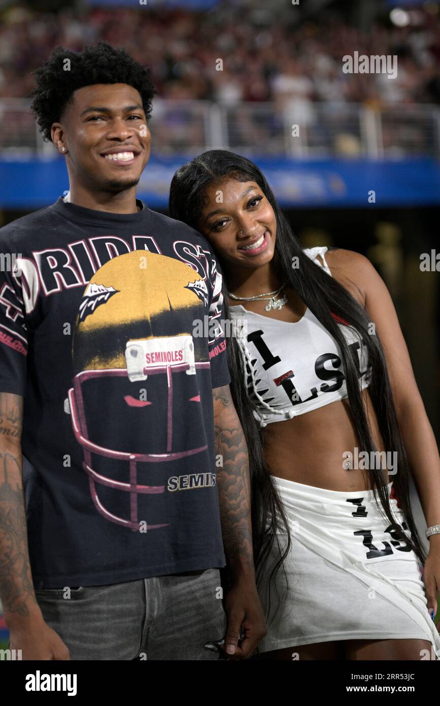 LSU basketball player Angel Reese, right, and Florida State basketball ...