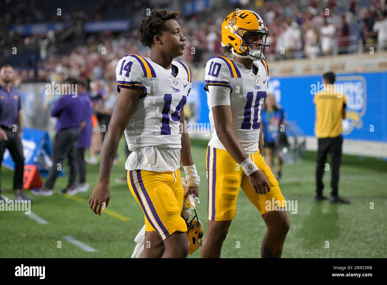 LSU wide receiver Jalen Brown (14) and quarterback Rickie Collins (10 ...