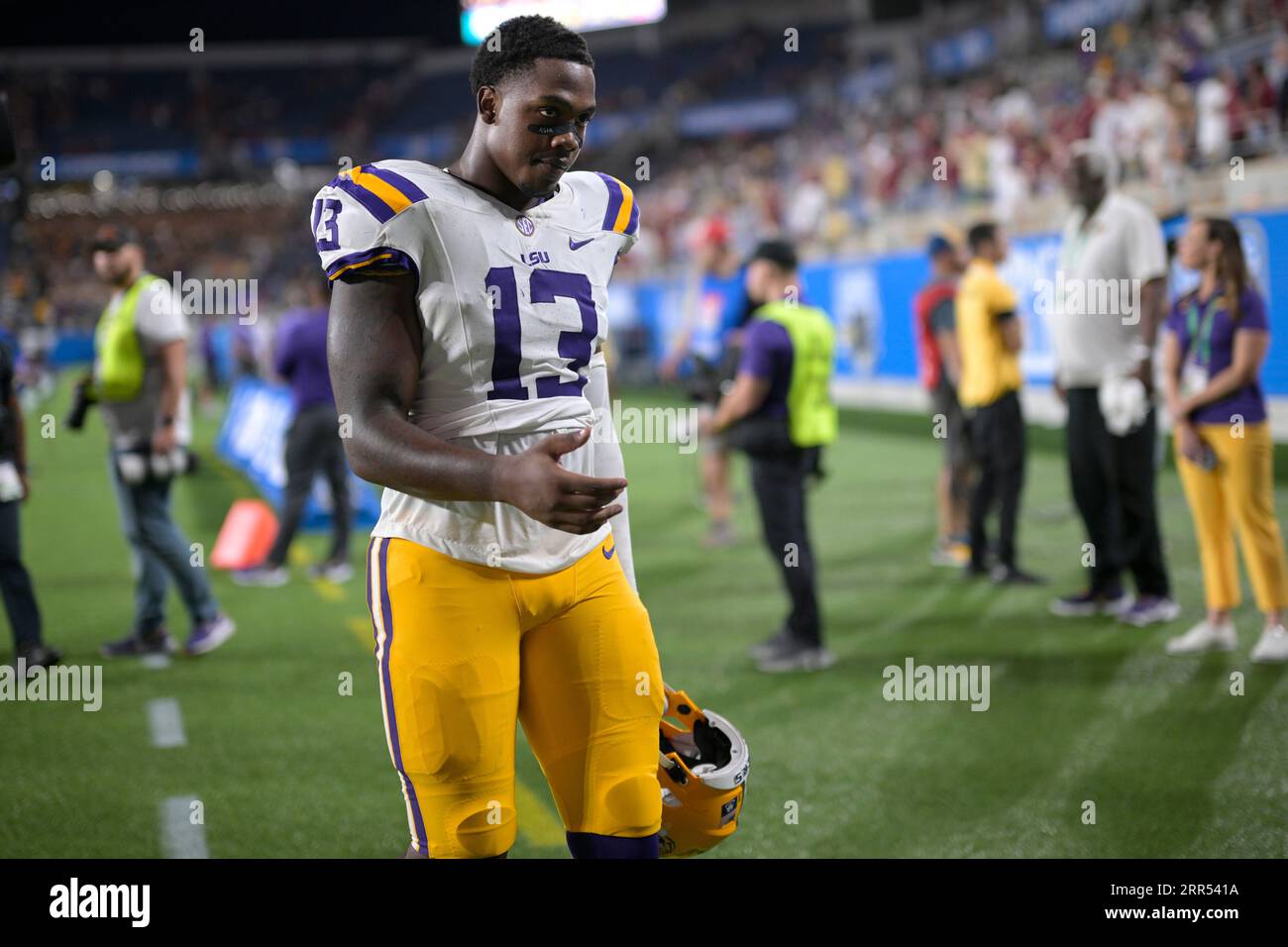 LSU defensive end Bradyn Swinson (13) leaves the field after an NCAA ...