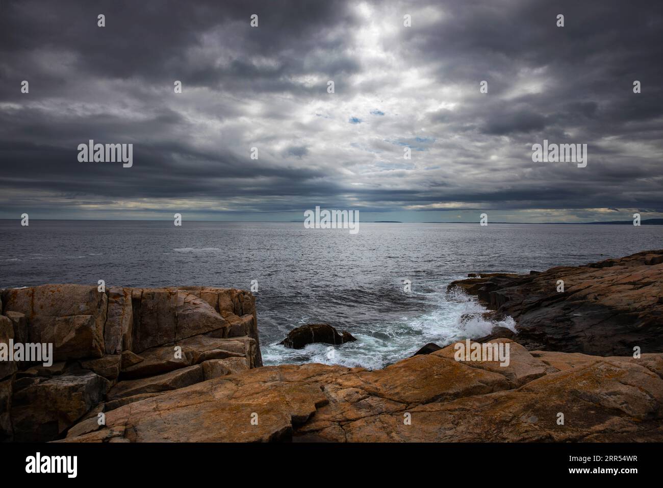 A dramatic, cloudy sky at Schoodic Point at the end of the Schoodic ...