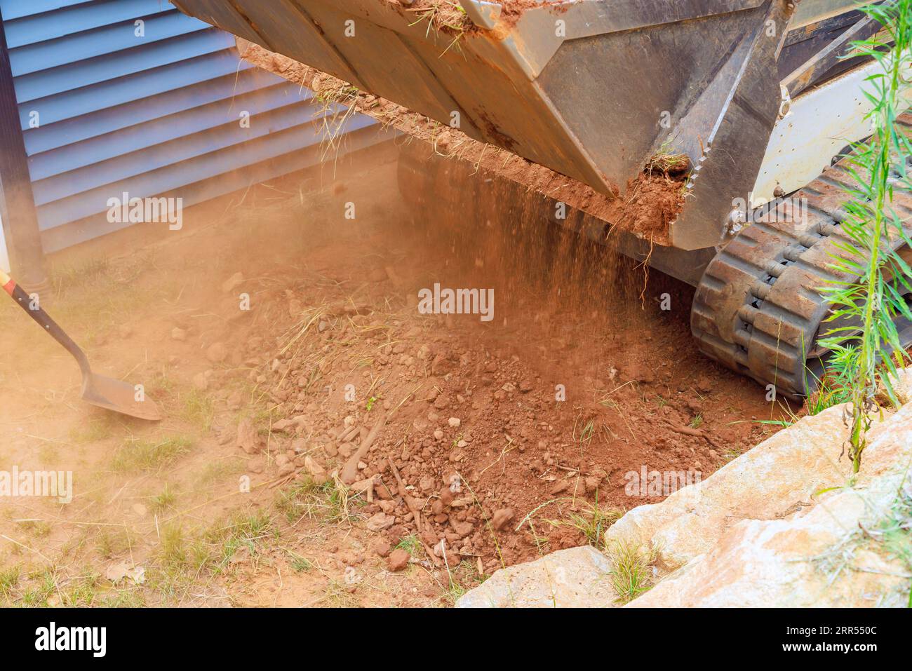 Mini bulldozer role in landscaping works encompasses earth moving tasks ...