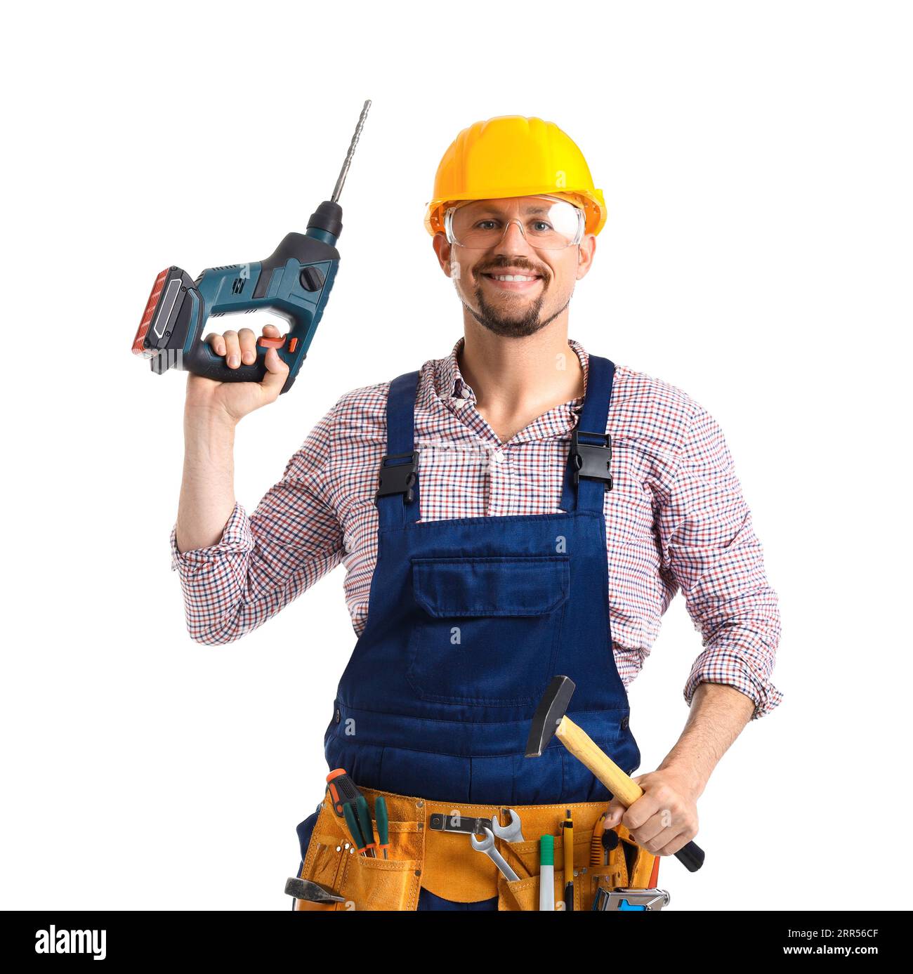 Male builder with drill on white background Stock Photo - Alamy