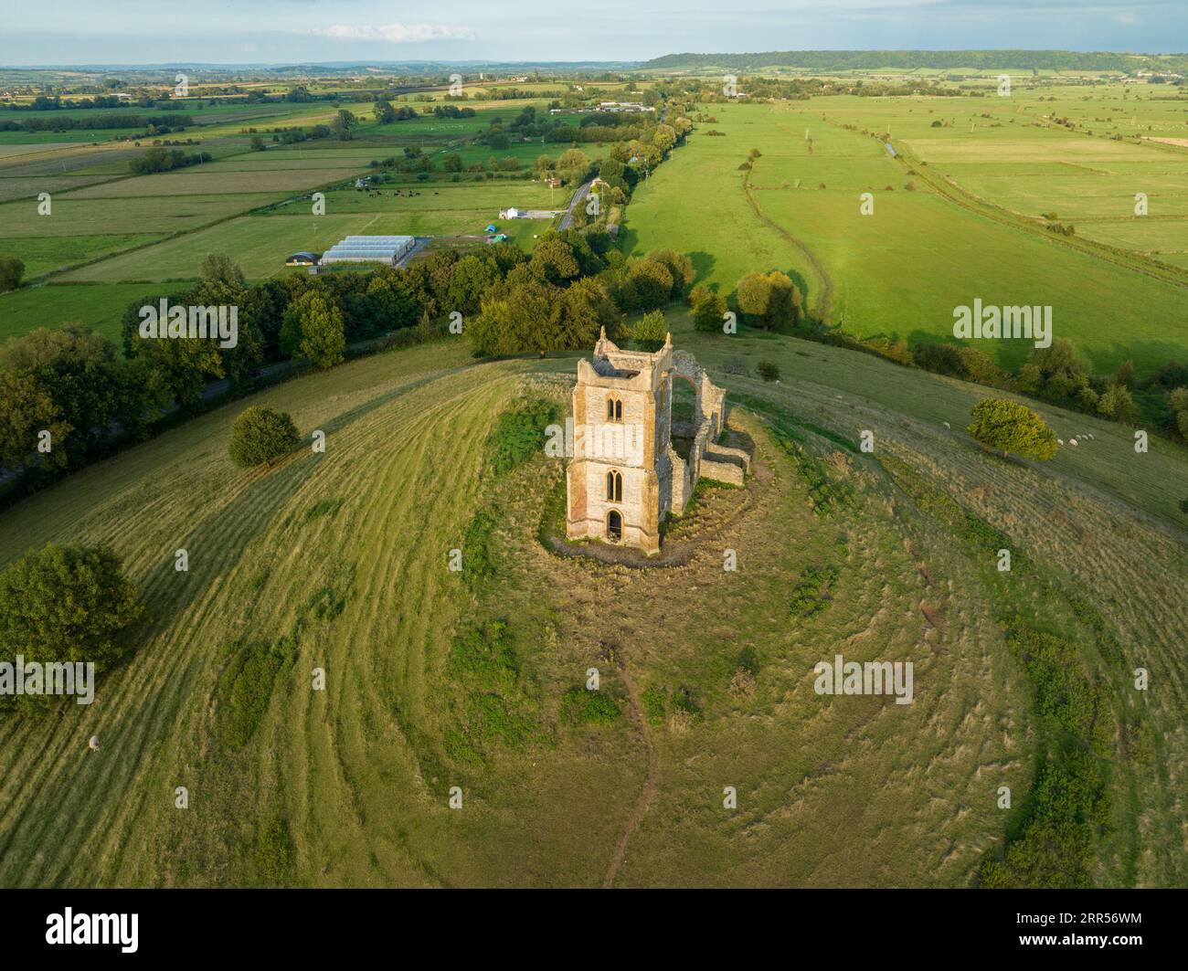 An aerial view of the picturesque Burrow Mump hill and historic site ...