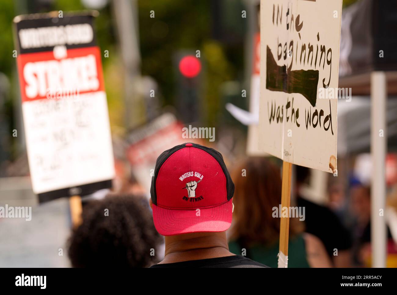 A picketer walks outside Walt Disney Studios, Wednesday, Sept. 6, 2023 ...