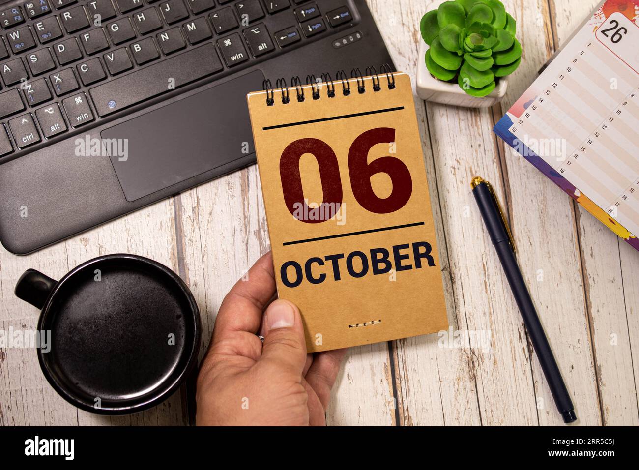 06 October text with blackboard background for calendar. And October is ...