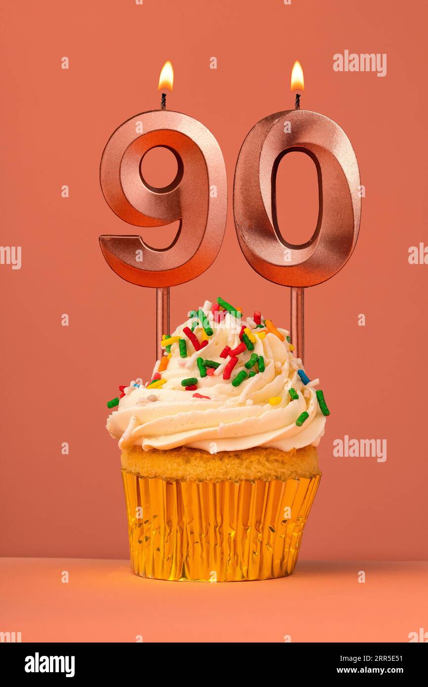Candle number 90 - Cake birthday in coral fusion background Stock Photo ...